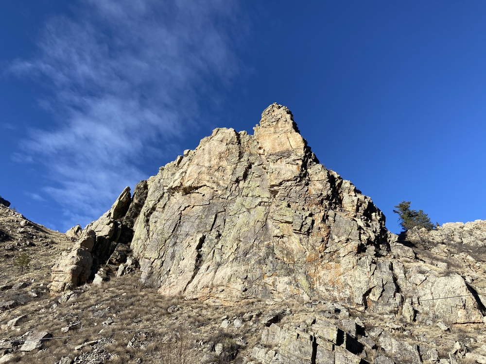 Climbing large crag west of Gateway Natural Area, Poudre Canyon
