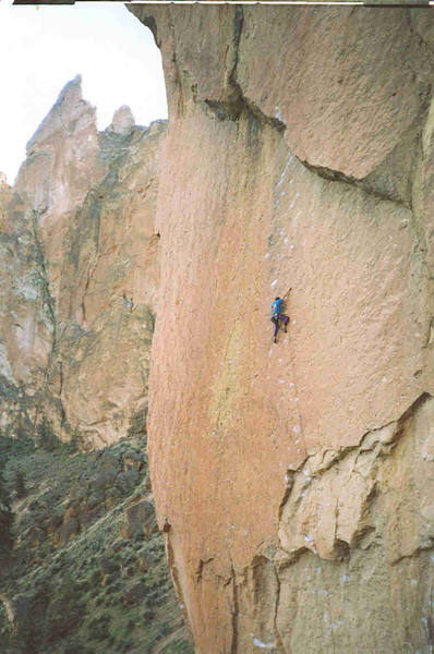 Sauntering up the steep slab on impeccable tuff below the second roof.