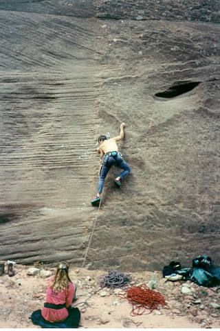 Climber on the second ascent showing the mantle start and the ...