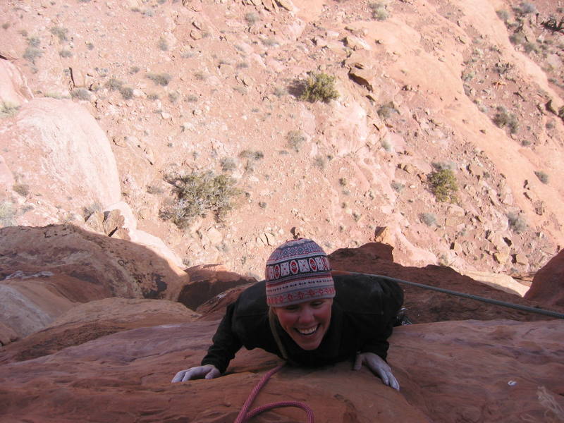 The late Erica Kutcher arriving at the top of the first pitch.