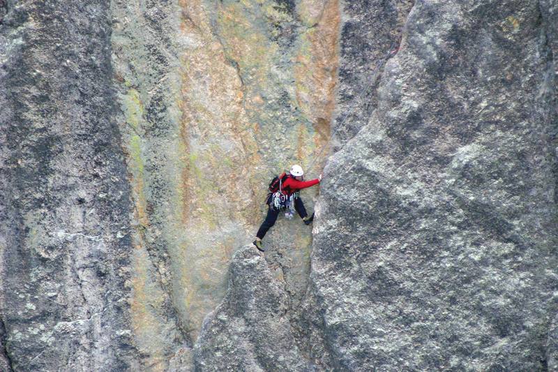 Angela Arp pauses to find some crystals for her feet halfway up pitch one.