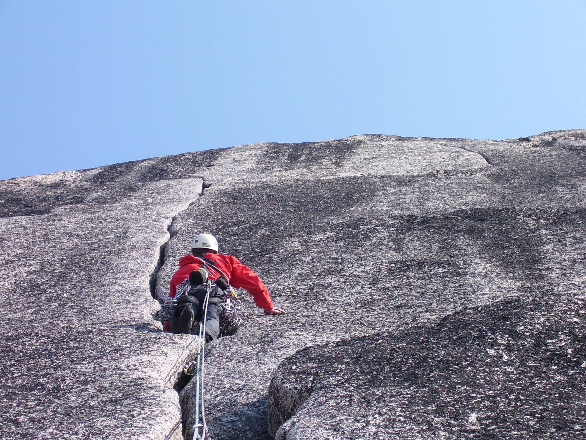 The last pitch, hands and fists for 100', then hand traverse right and ...