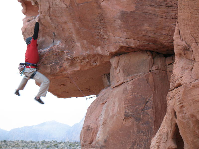 Patrick Hudson throws the crux move on a chilly day.