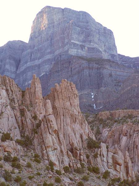 Notch Peak rises above the pink granite of Sawtooth Canyon.
