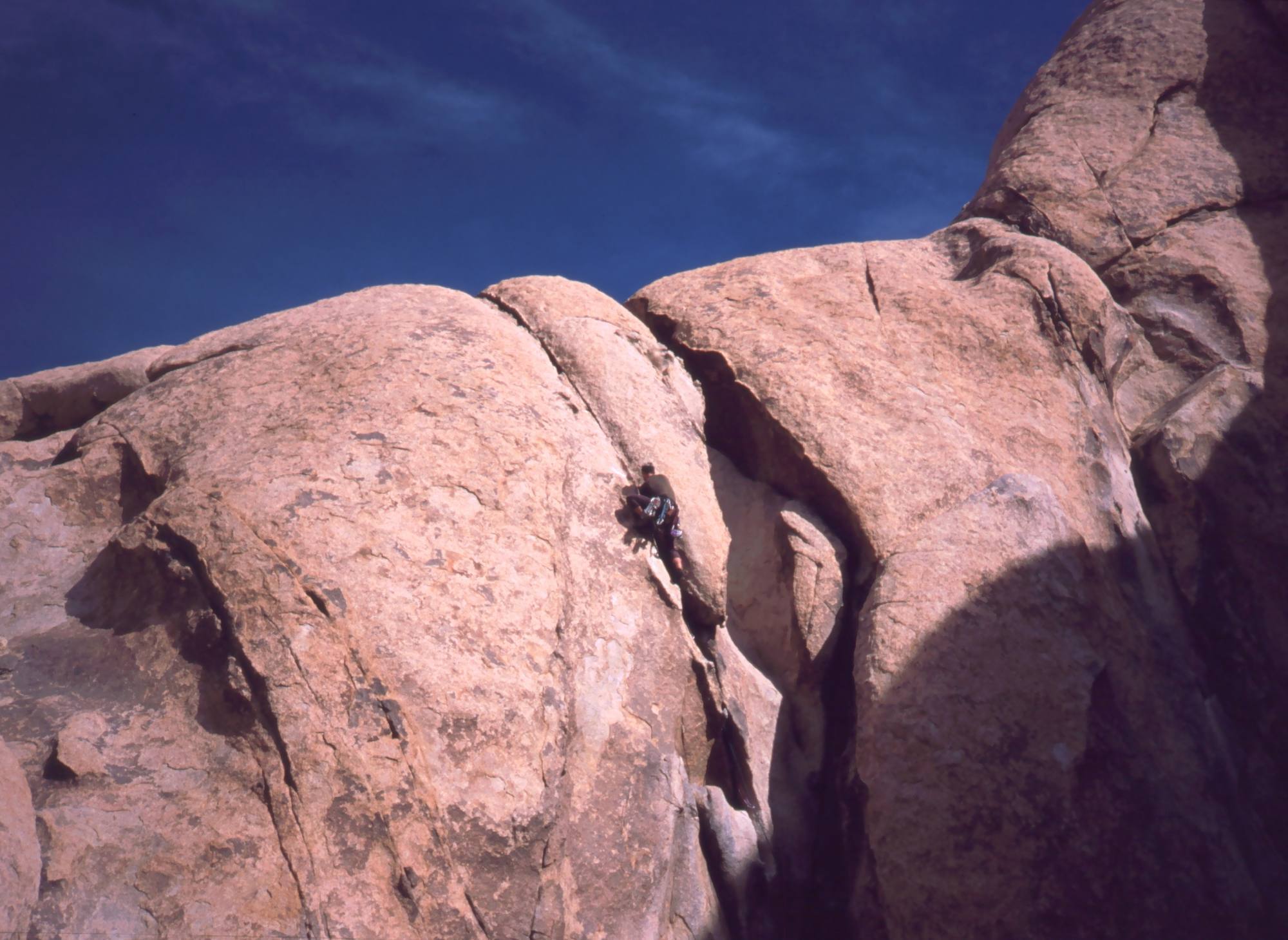Tony Bubb leads up on 'Dangling Woo Li Master' (10a) in the Bighorn ...