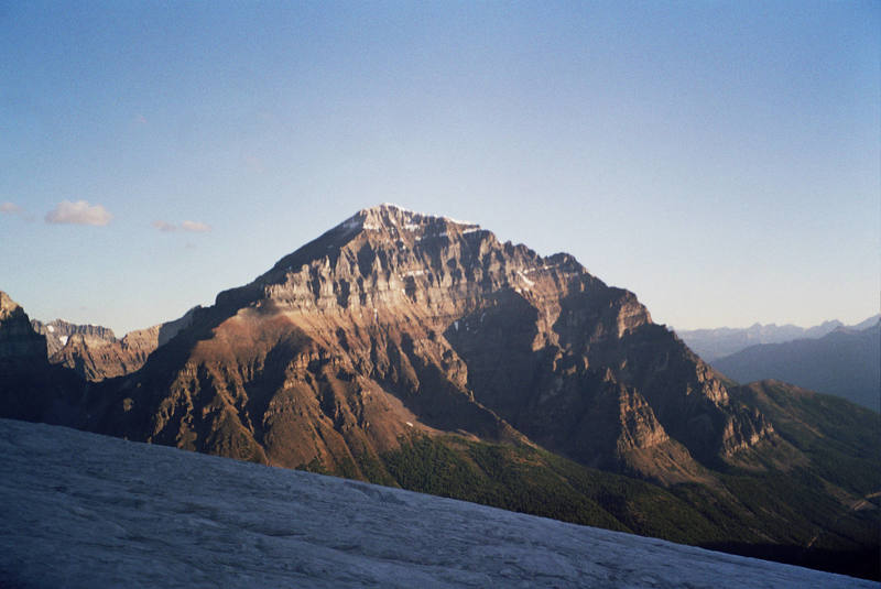 The south face of Mt. Temple showing the east ridge (right skyline) and ...