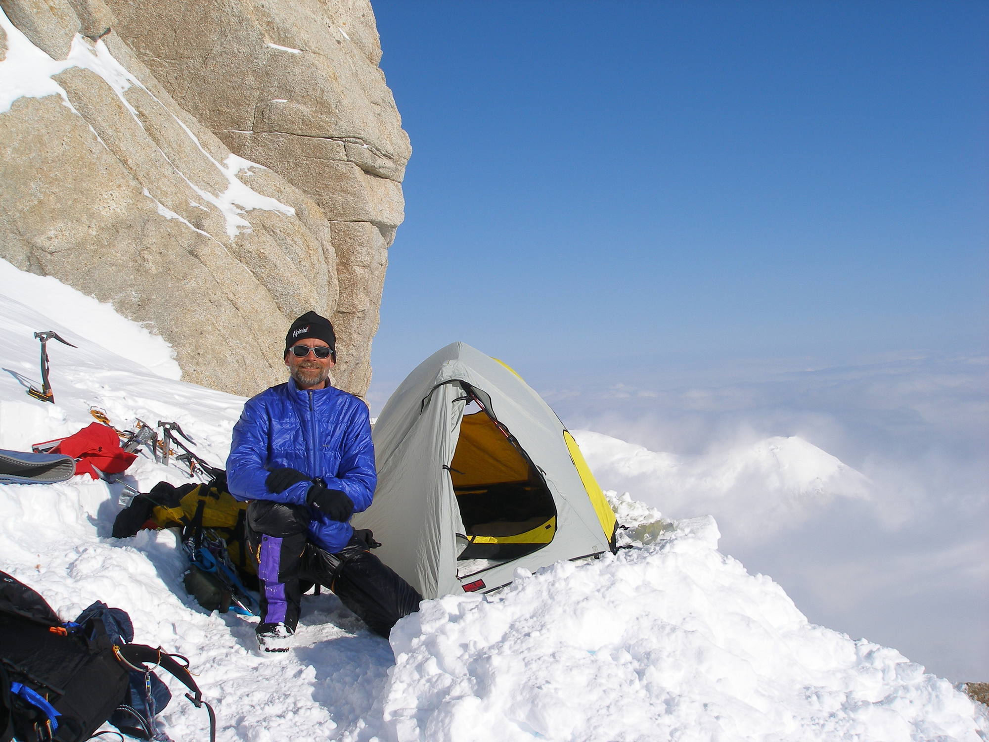 A tent platform shoveled out of a slope at 16,300 feet, just below the ...
