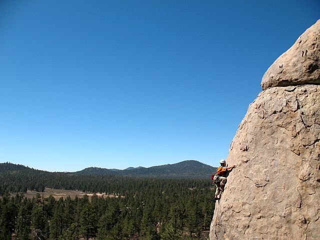 Obi near the top of Pistol Pete (5.10a), Holcomb Valley Pinnacles