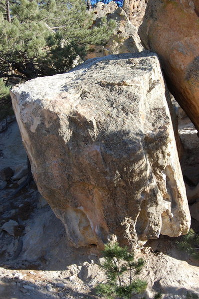 This boulder is on the right side of the path.