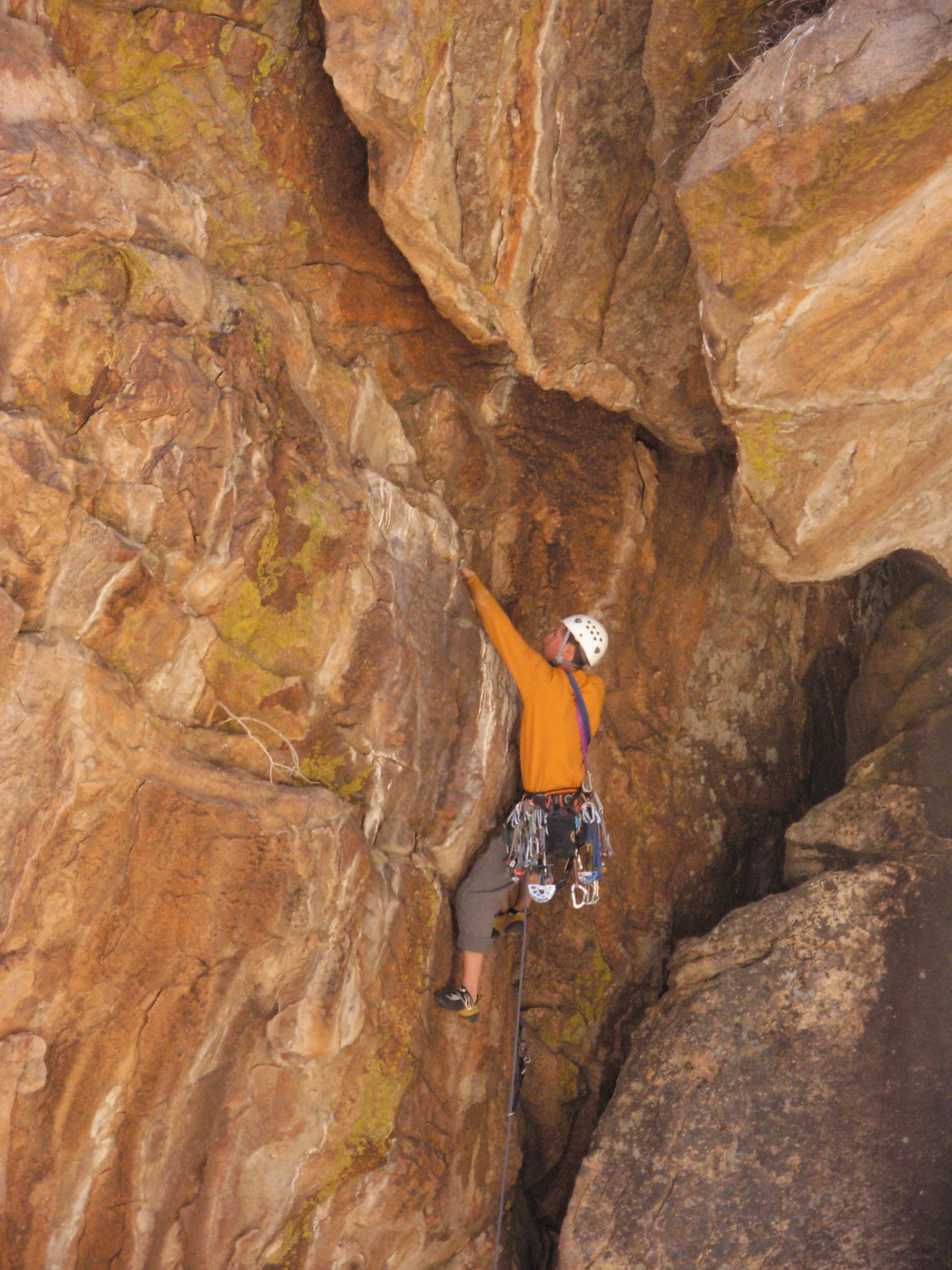 Overhung climbing on steep jugs with good feet. Continues up and left ...