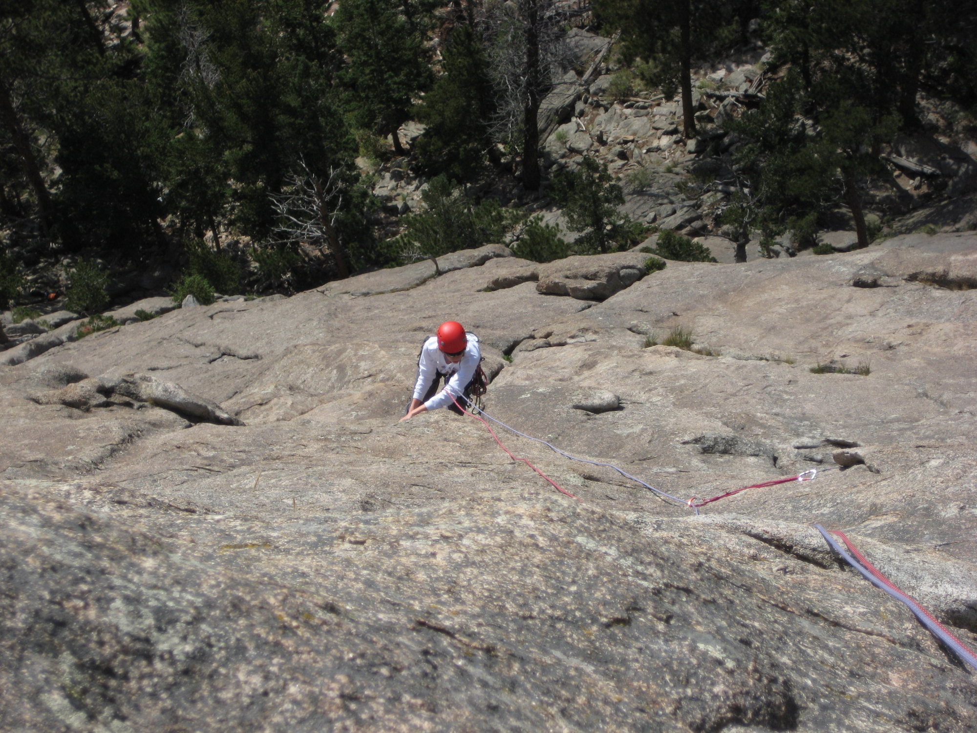 P3: Kody pulling up on the knob above the optional walk-off ledge. Rope ...