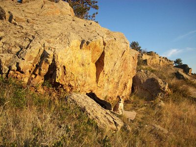 Climbing in The Burnt Orange Boulder, Fort Collins