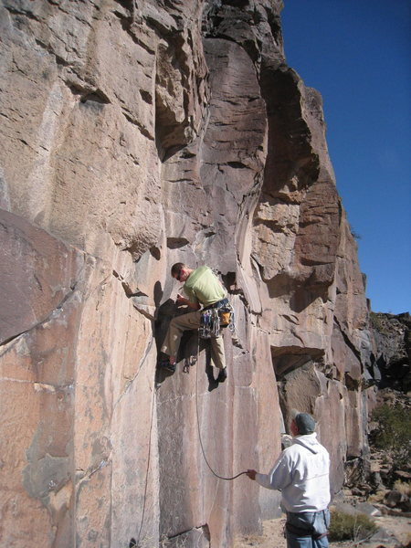 Finishing the bouldery crux of the route and about to head into easier ...
