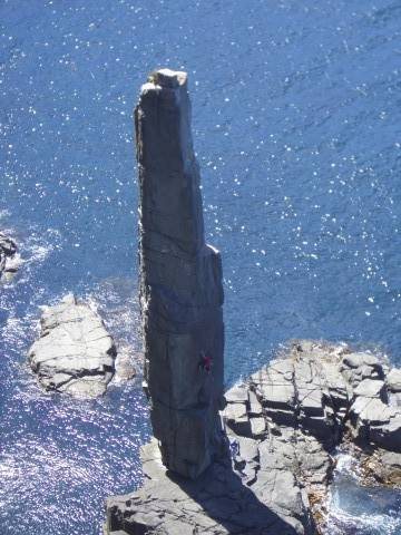 There's a 5.12a-ish "sport climb" on the South side of the pillar ...