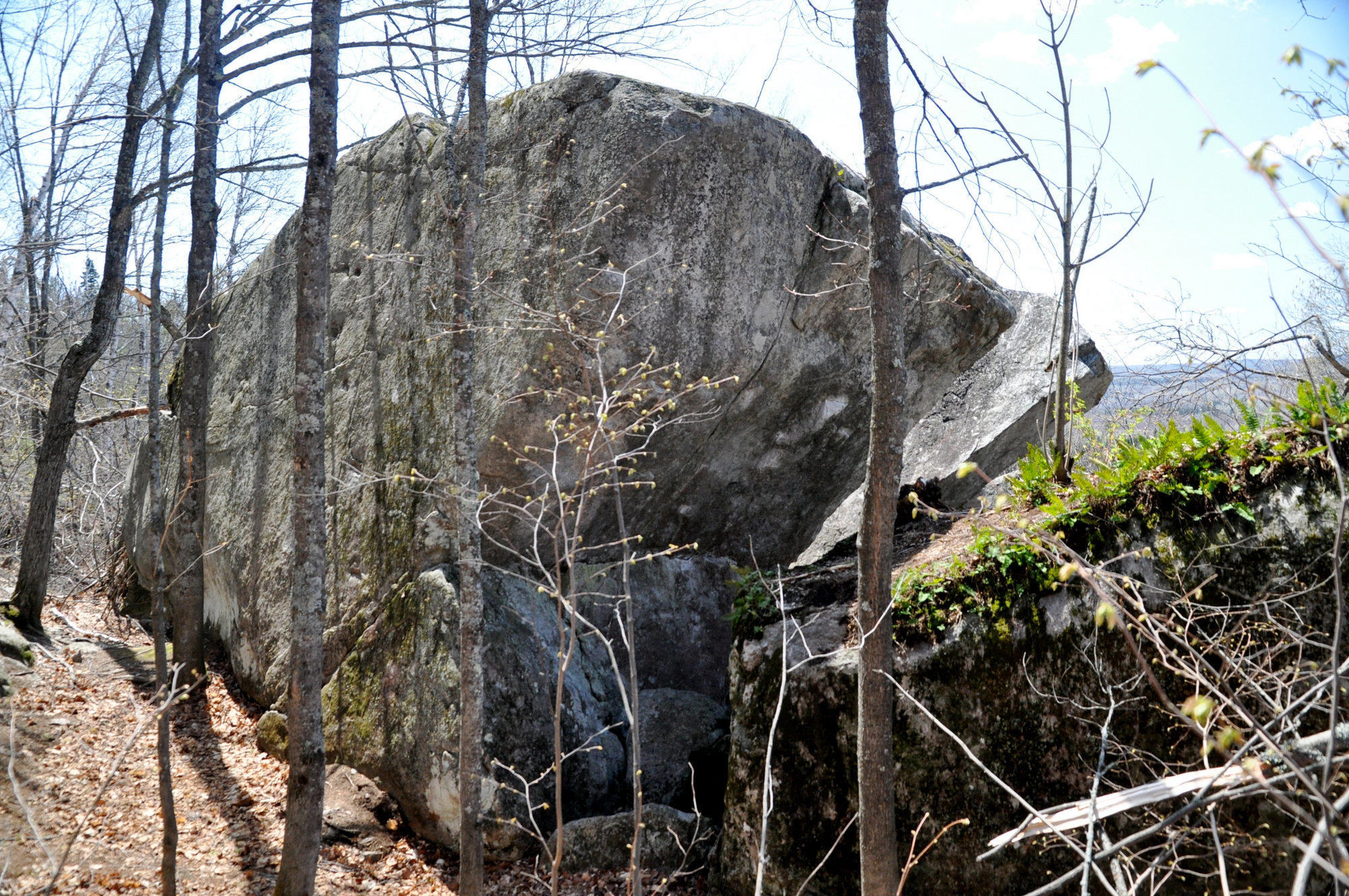 This is the slab boulder as you approach it. The split in the rock is ...