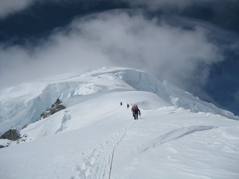 Looking up the heavily-crevassed slopes above 12,000 ft
