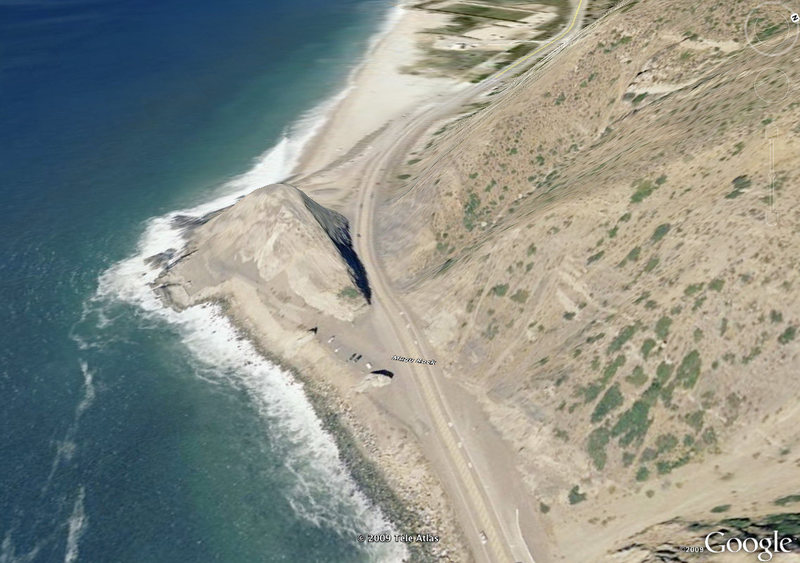Aerial view of Point Mugu, showing the large parking turnout and Mugu Rock.