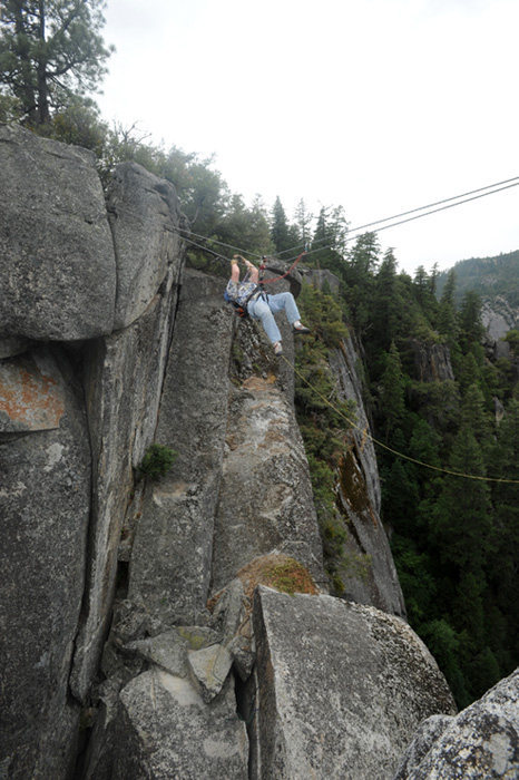 David Hoffberg uses a tyrolean traverse to get back to the rim after ...