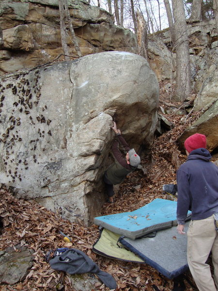 Climbing in Sloper Madness Boulder, Southern WV
