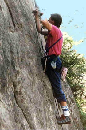 Reese Martin drilling on lead during the first ascent of From the Ashes ...