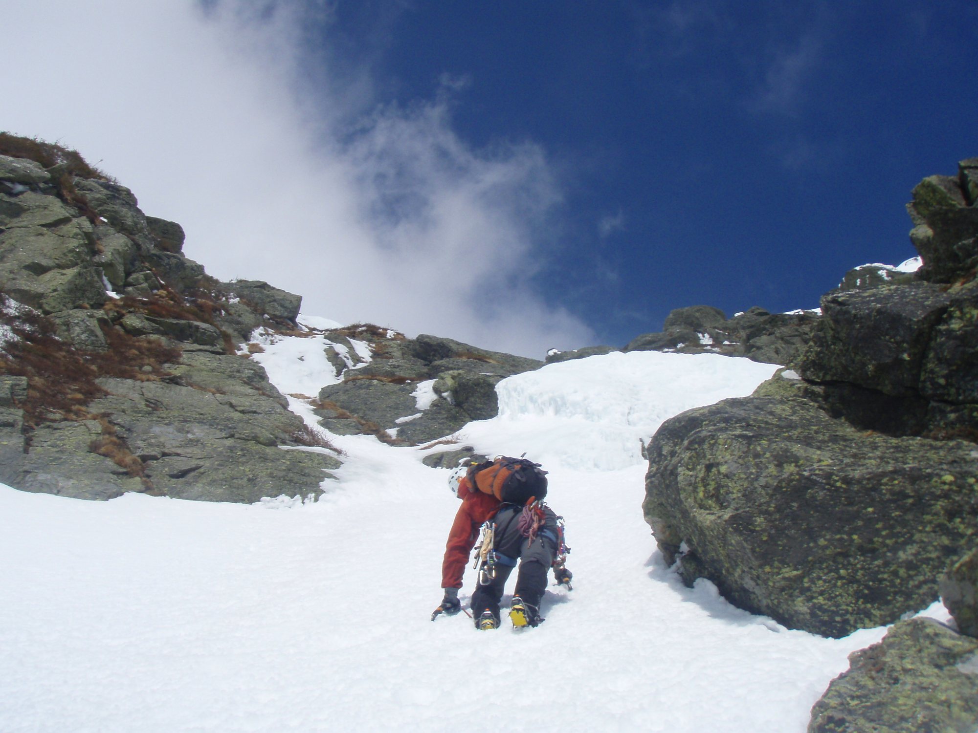 Peeking Around A Corner To Check Out An Ice Bulge High In Yale Gully