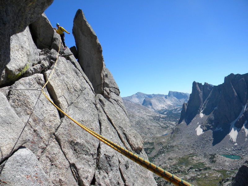Exposed step around the boulder pitch
