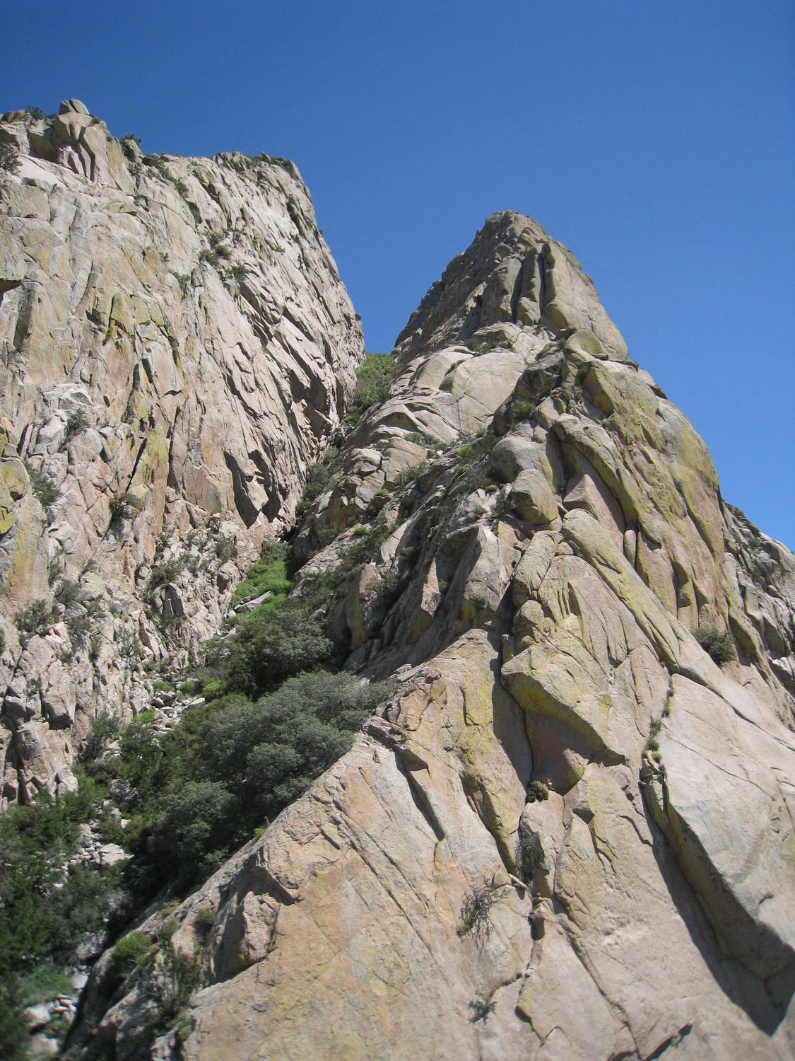 Looking up at the West Ridge from the second saddle described in the ...