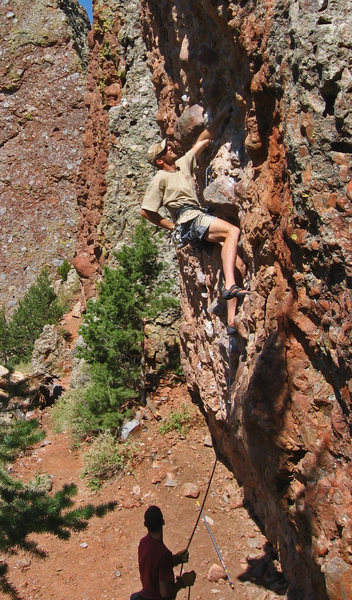 Alex Starting Nine Lives during the first ascent