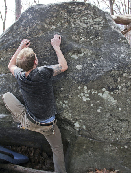 Climbing in V2 Boulder, Rumbling Bald