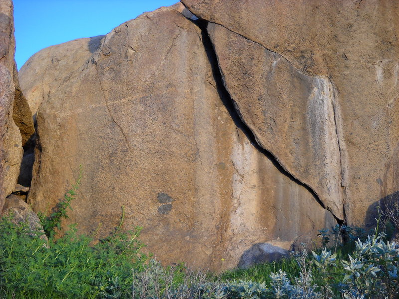 The Half Moon crack is located in a recess downhill from the Turtle Dome.