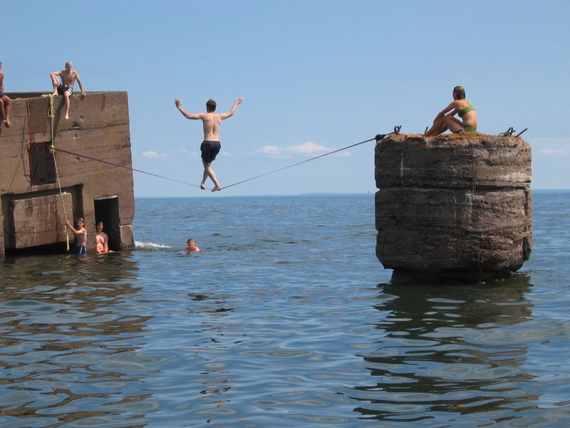 Josh slacklining the "Ice Box" just off of Canal Park in Duluth, MN.