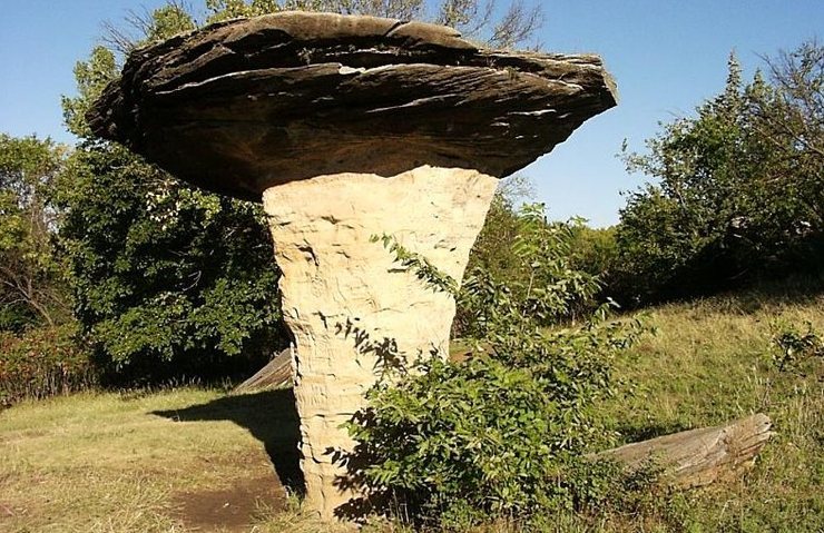 The smaller of two mushroom rocks.