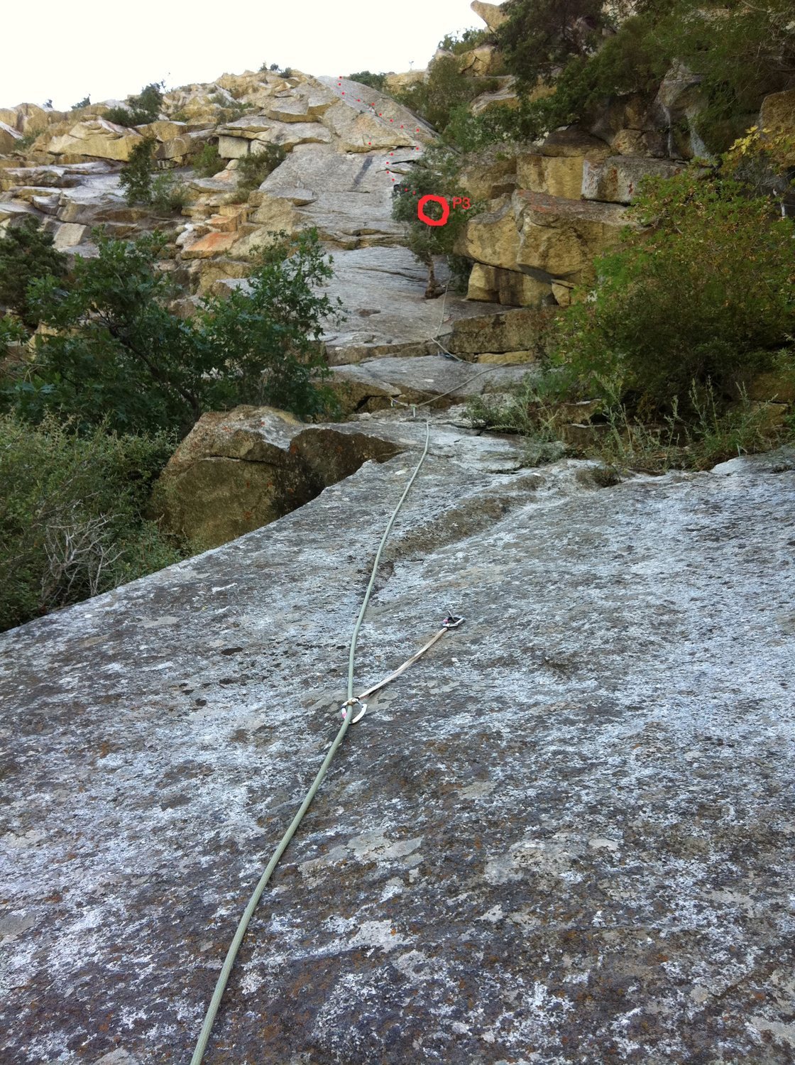 Pitch 2 and first few moves of Pitch 3, from the belay. The black ...