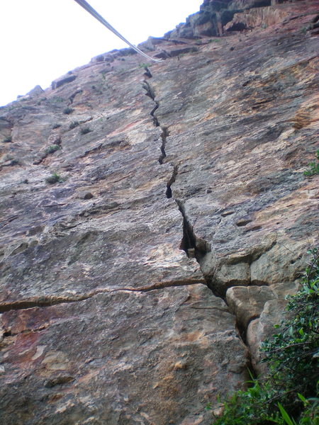 Freedom Crack from the sloped grassy ledge