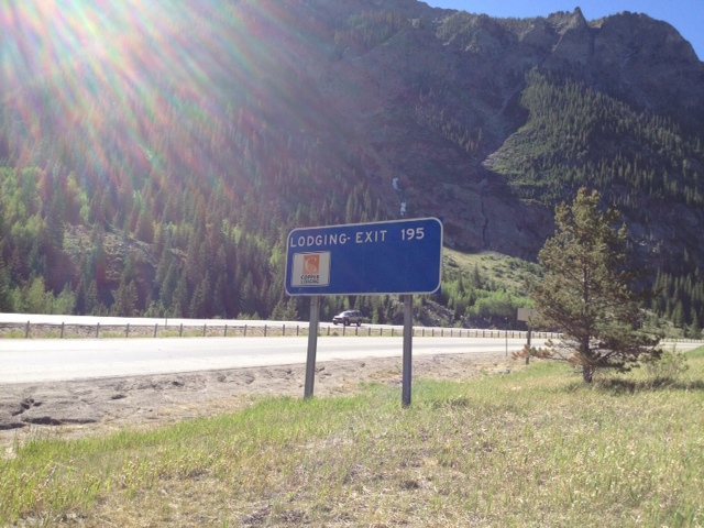 Make a hard right turn shortly after seeing this exit sign.