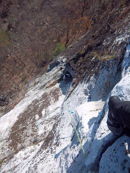 Adam starting up the fun stemming corner on pitch 3(5.9) of Keep on ...