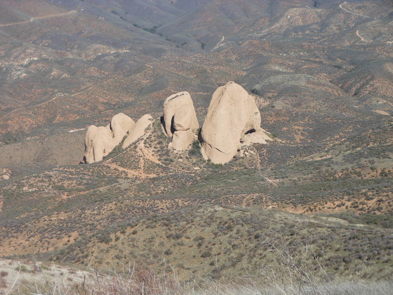 A distant view of the formations at Texas Canyon from the road that ...
