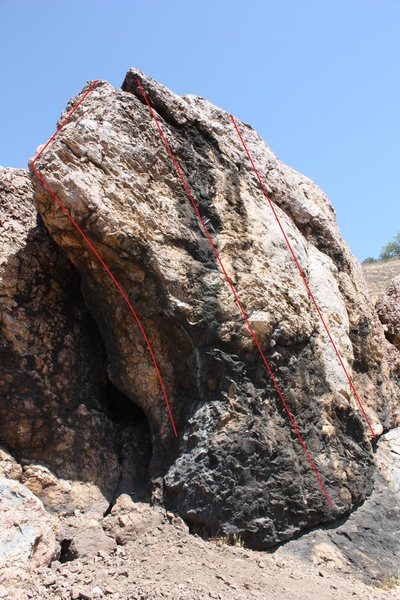 This boulder has three routes 2 face routes and 1 inverted. They are ...