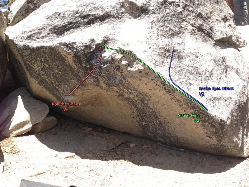 Climbing in Roll the Bones Boulder, San Jacinto Mountains