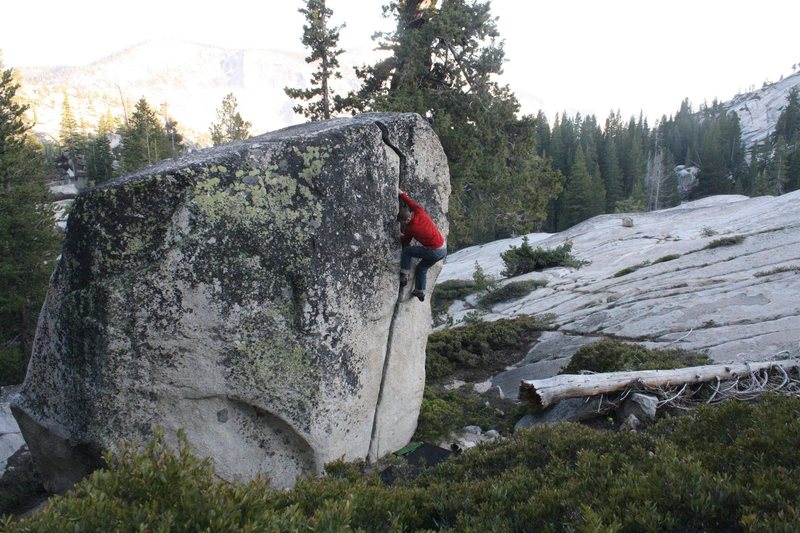Climbing in Olmsted Crack Boulder, Yosemite National Park