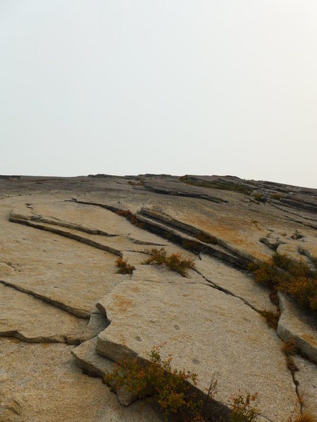 the arching flake crux pitch (left most one that's fully visible)