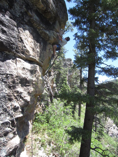 Dan Greenwald cranking the first ascent of Fathers Day