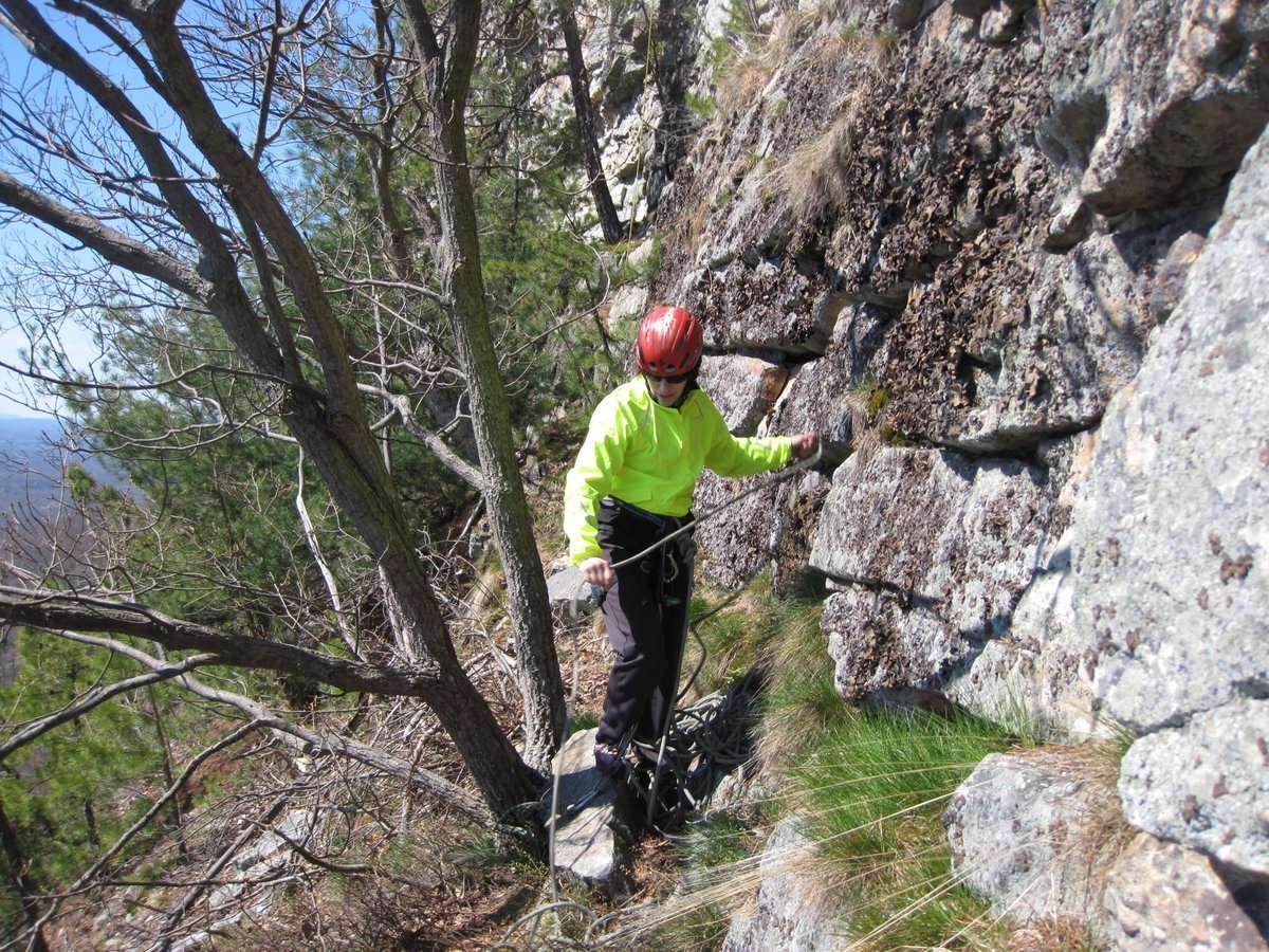 Gail flaking the rope on the "death" ledge. It's not so bad where you ...