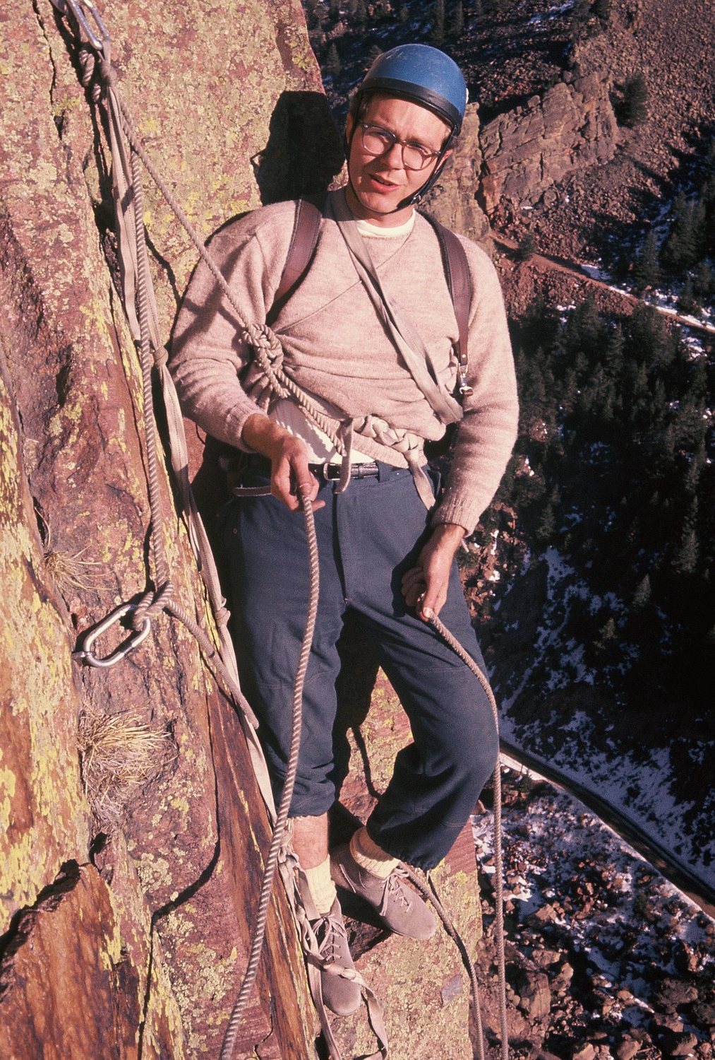 A very small belay stance at base of the slab. Rodger belaying; pitons ...
