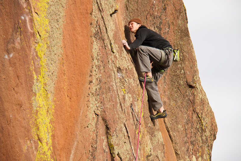Balancey moves before an intimidating mantel.