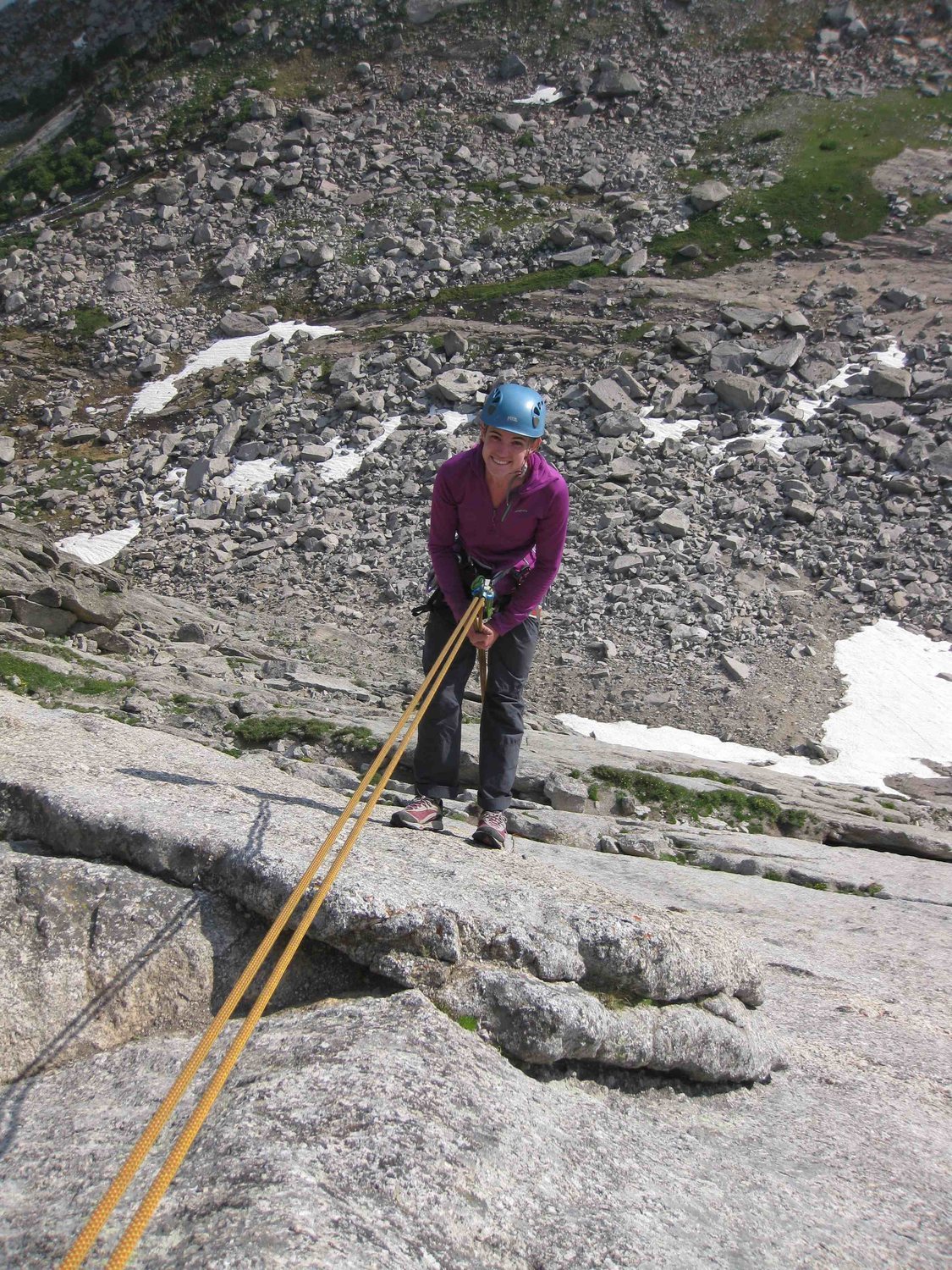Last of four single rope raps. Finishes on grassy ledge.