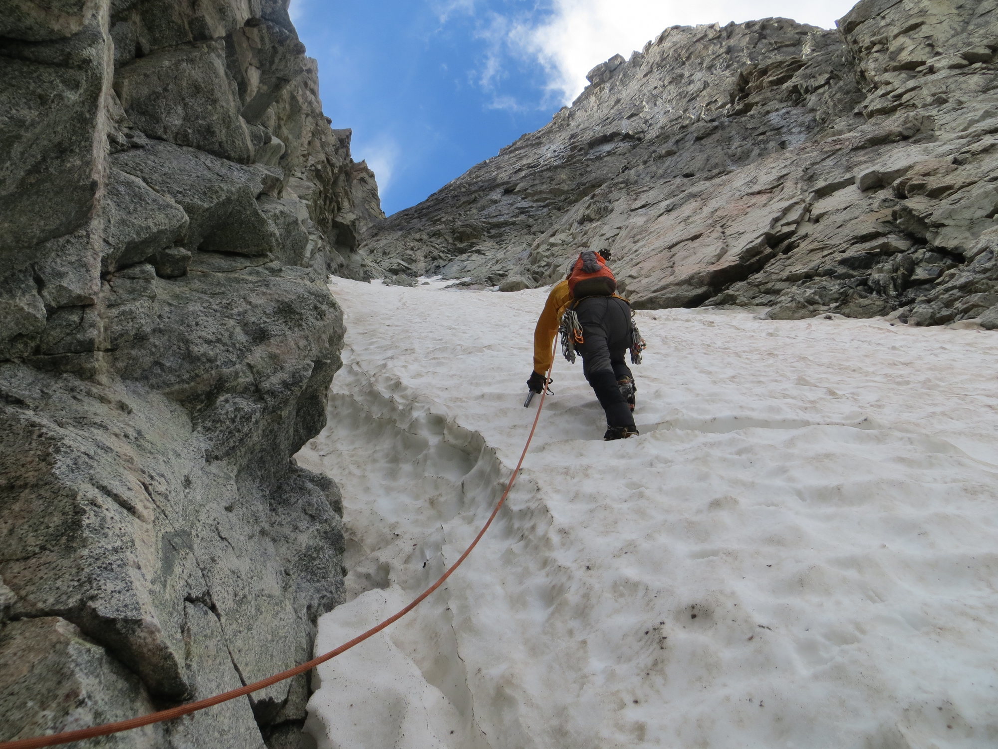 About midway up, as the snow field begins to steepen.