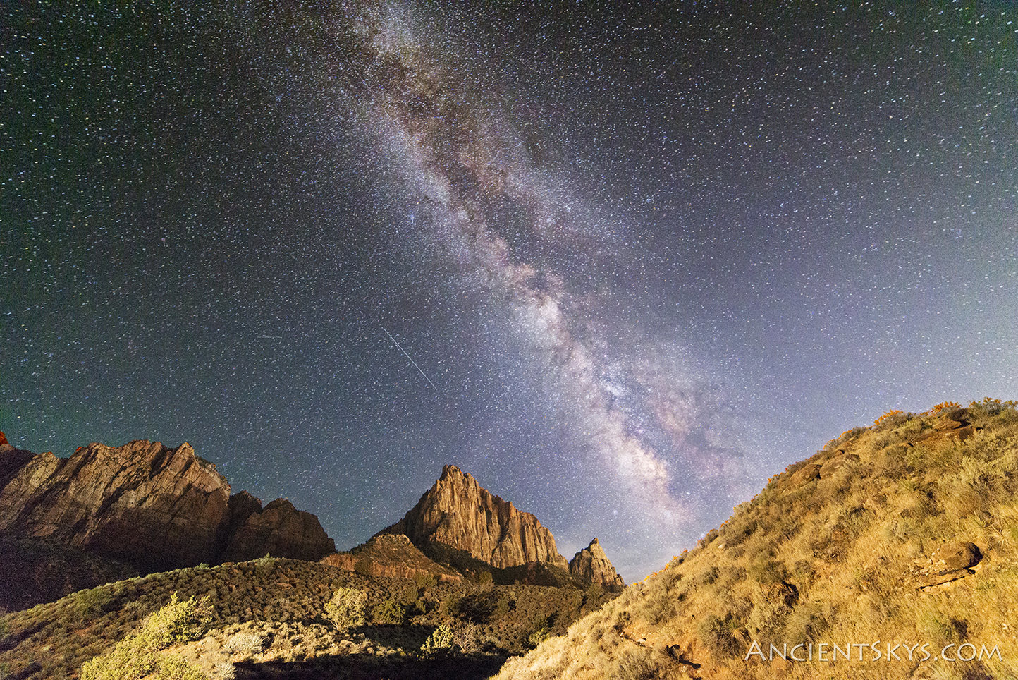 The Watchman at night. Illuminated from the crescent moon and light ...