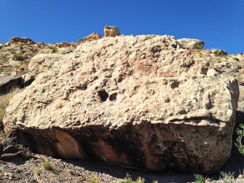 The main face of Ghost Eyes Boulder.