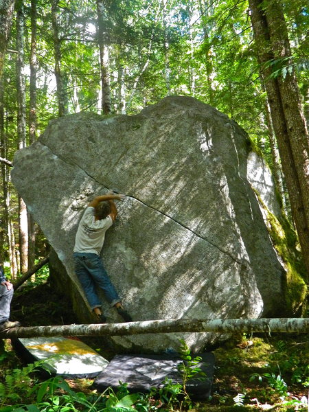 Climbing in The V3 Boulder, Northwest Region
